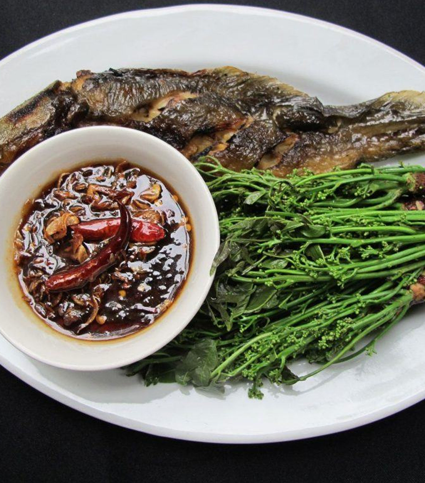 Grilled Fish with Garlic and Coriander (Plaa Phoa) – Taj Stores